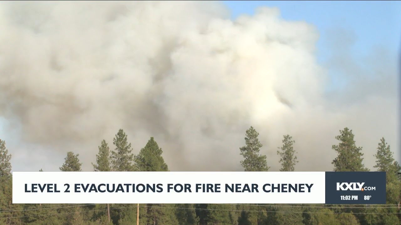 Evacuations downgraded for wildfire burning near Cheney - YouTube