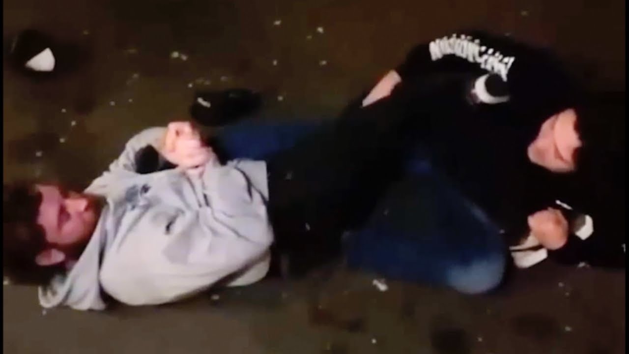 Jiu jitsu man ends a street fight with a decisive heel hook - YouTube