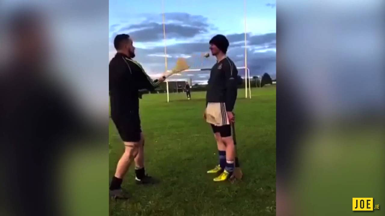 Dangerous hurling trick shot - YouTube