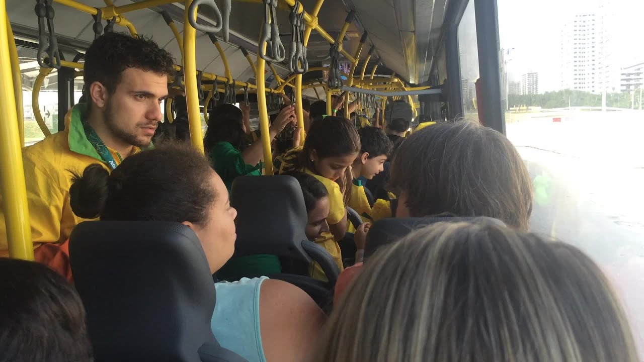 Brazil soccer fans riding the bus - YouTube
