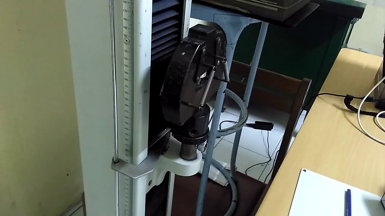 Pengujian bagian pengaturan ON OFF dan arah lower grip mesin uji tarik ...