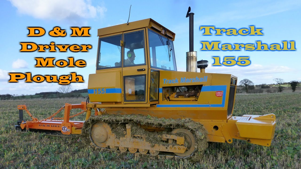 Track Marshall 155 pulling a D & M Driver Mole Plough - YouTube