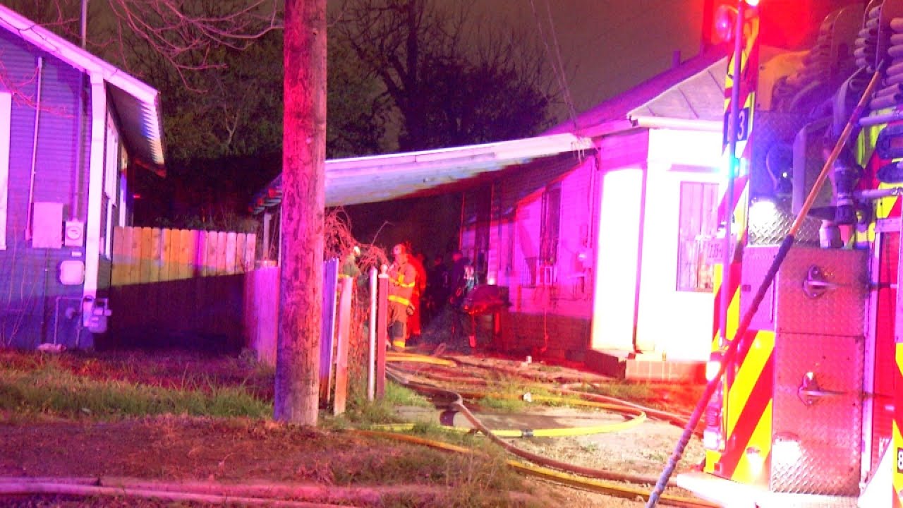 Firefighters battle shed fire behind home on city’s East Side - YouTube