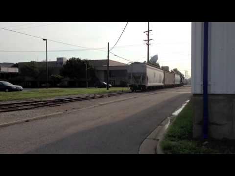 CSX SW1500 #1102 with ex-Chessie System C-27a caboose switching ...
