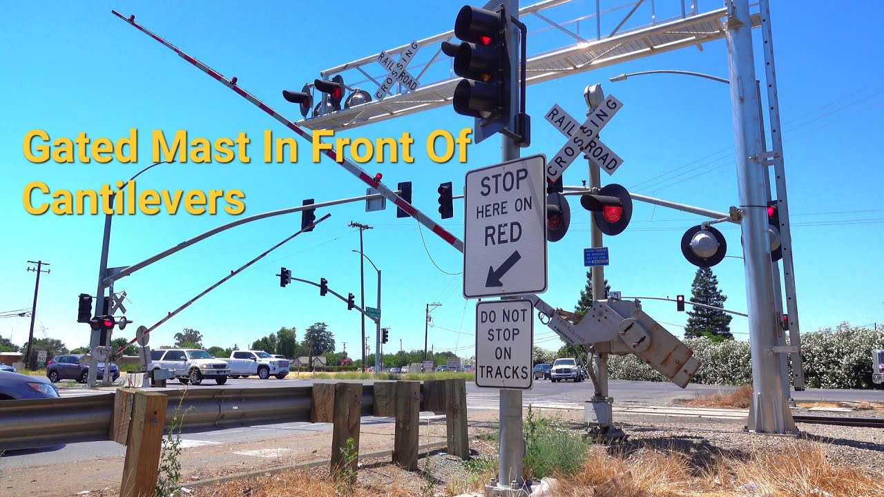 Railroad Crossings With Gated Masts In Front Of Cantilevers Youtube