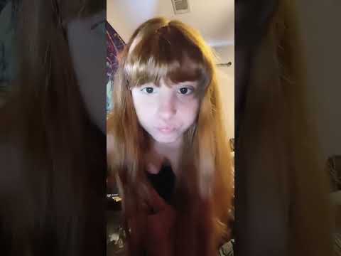 Beautiful girl getting ready to go out shows off her assets (Downblouse)