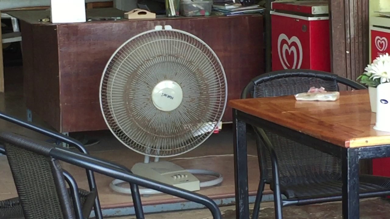 Hatari brand portable fan in a restaurant - YouTube