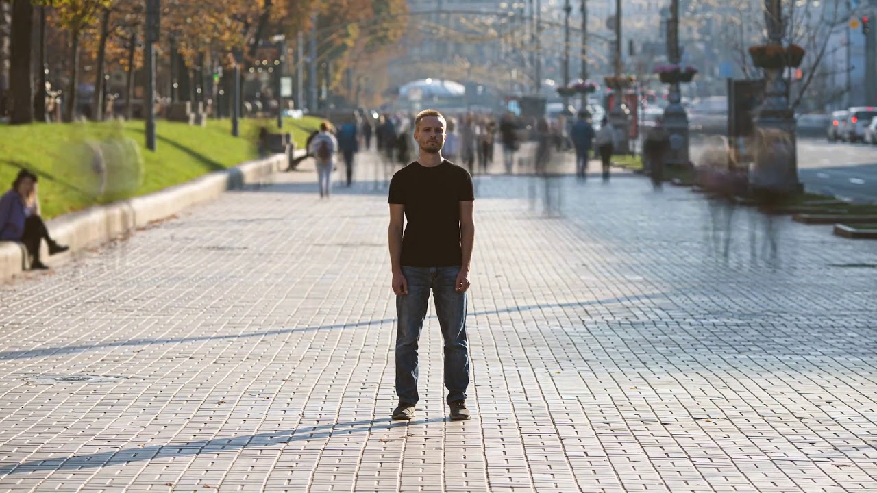 The young man stands in crowdy street time lapse - no copyright - YouTube