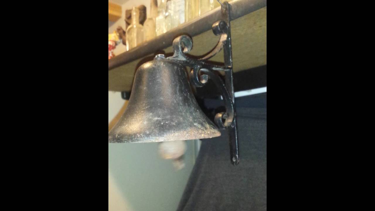 Vintage cast iron dinner bell - YouTube