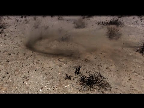 Walking into a small Dust devil in the almost windless Desert - YouTube