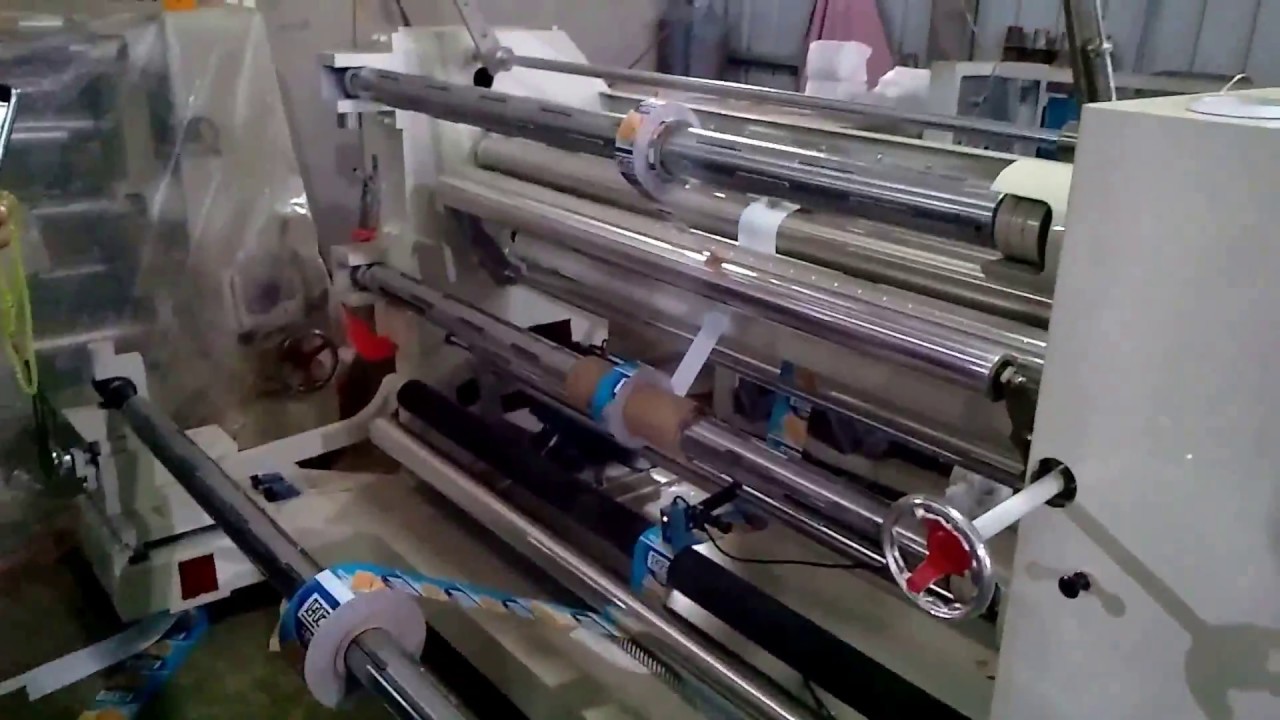 Vertical slitting machine, - YouTube