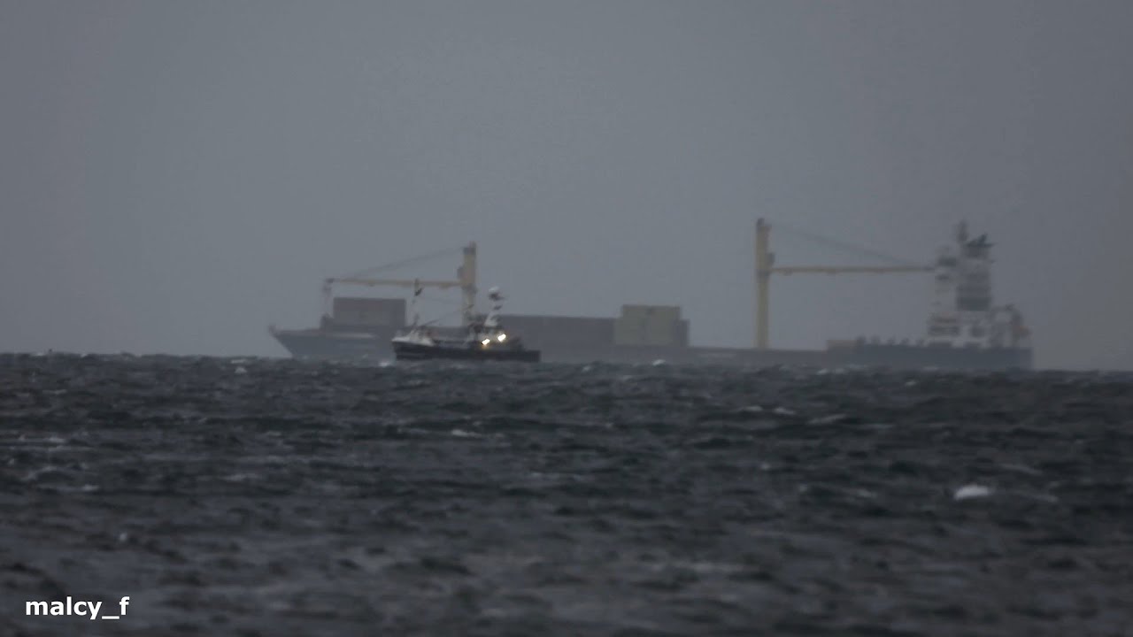 Zooming in on... Fishing vessel Carousel with MSC Tamishka F passing ...