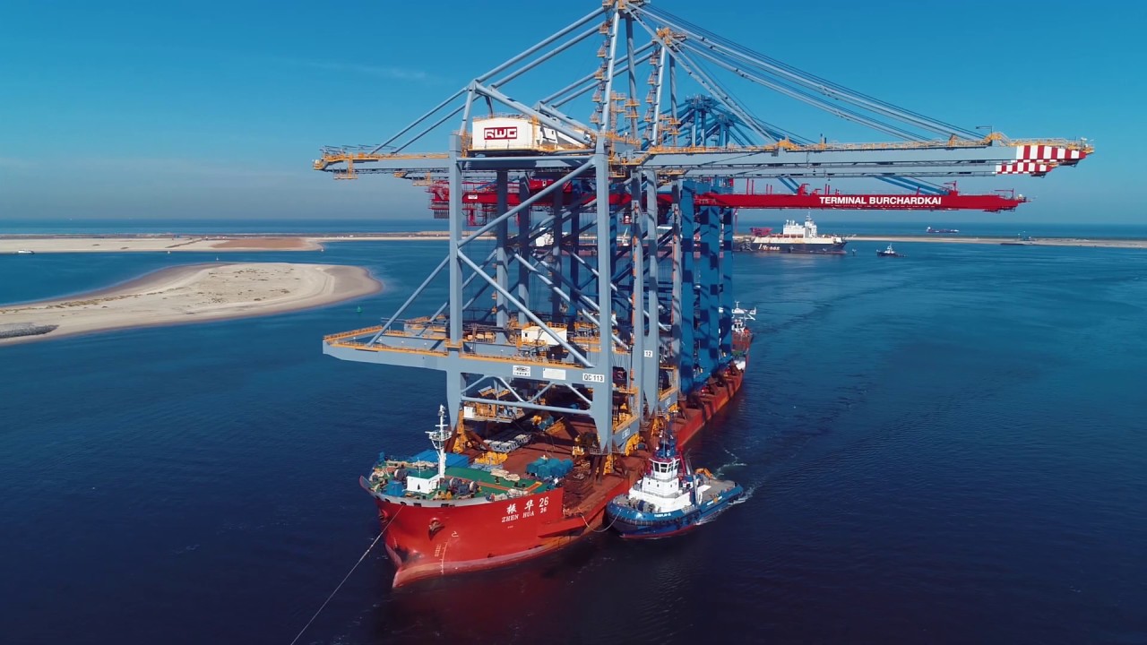 Arrival of two new deep sea quay cranes at RWG - YouTube