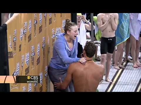 Swimmer makes surprise marriage proposal in Mo.