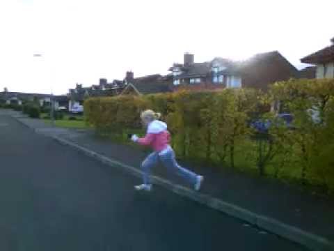 Toni jumping over a bush - YouTube