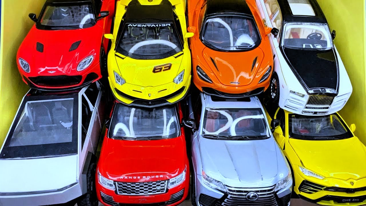 Box full of various miniature cars Peugeot, Jaguar, Pagani, Hyundai ...