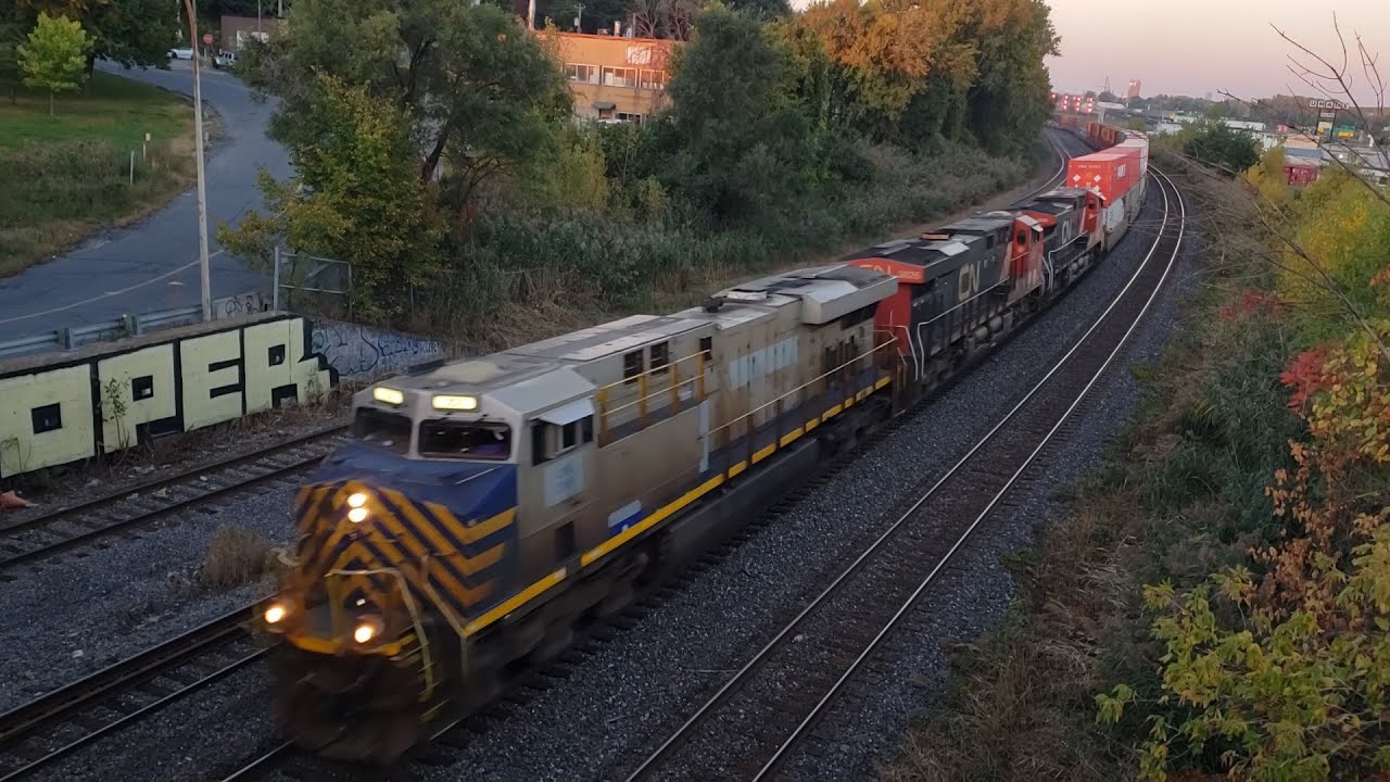 FALL TRAINS CN Double Stack Westbound with DPU and 150 Wells in Tow at St Jacques Overpass - YouTube