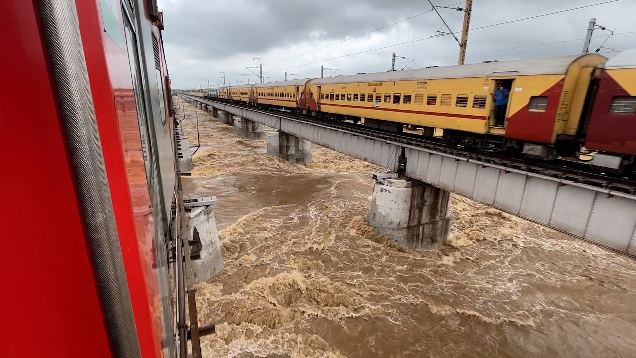 Dangerously Overflowing River and Train Crossing over it | My Lucky ...