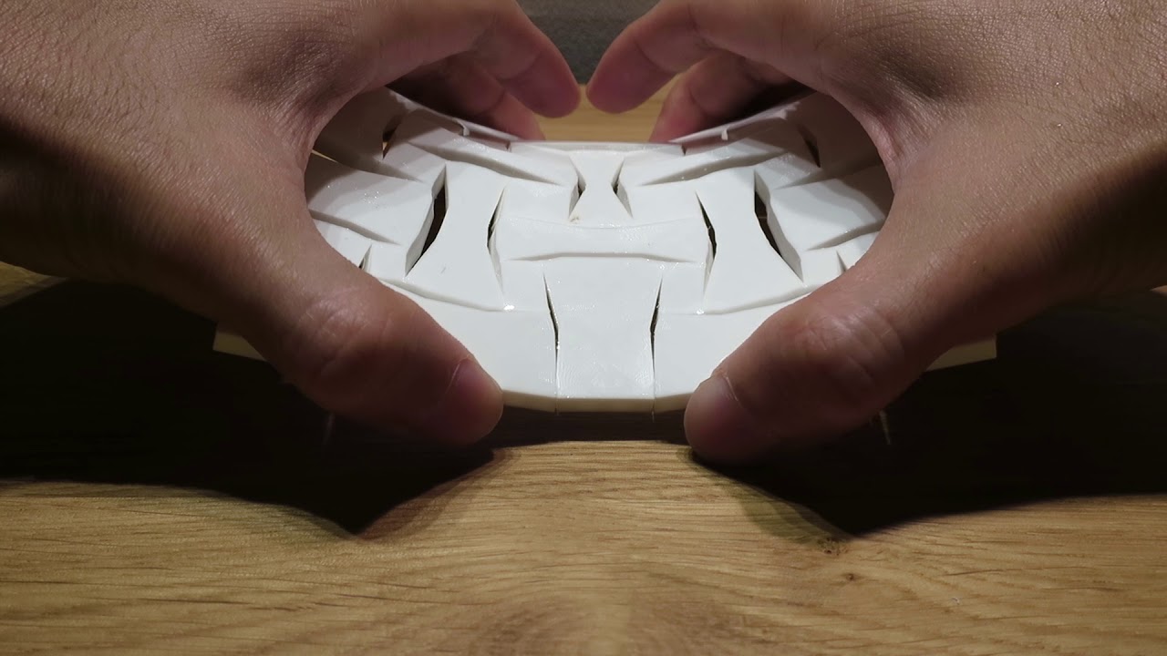 Bistable Auxetic Saddle Surface - YouTube