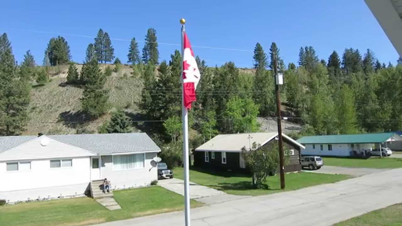 Flagpole installed and first raising of the Canada Flag!! Woohoo! - YouTube