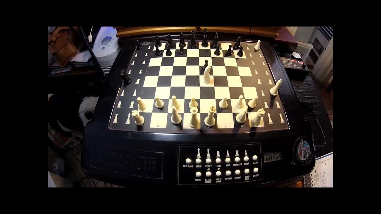 computer chess room Scisys leonardo vs novag solo replayed on the mirage automated board - YouTube