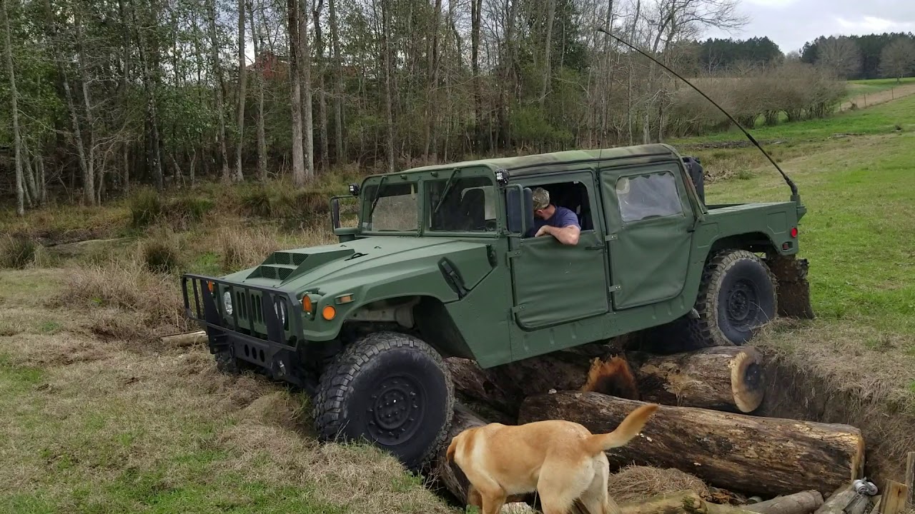 HMMWV Crossing wash out (Stuck) - YouTube