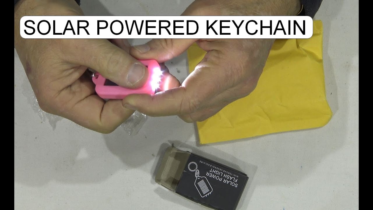 UNBOXING SOLAR POWERED KEYCHAIN FLASHLIGHT - YouTube