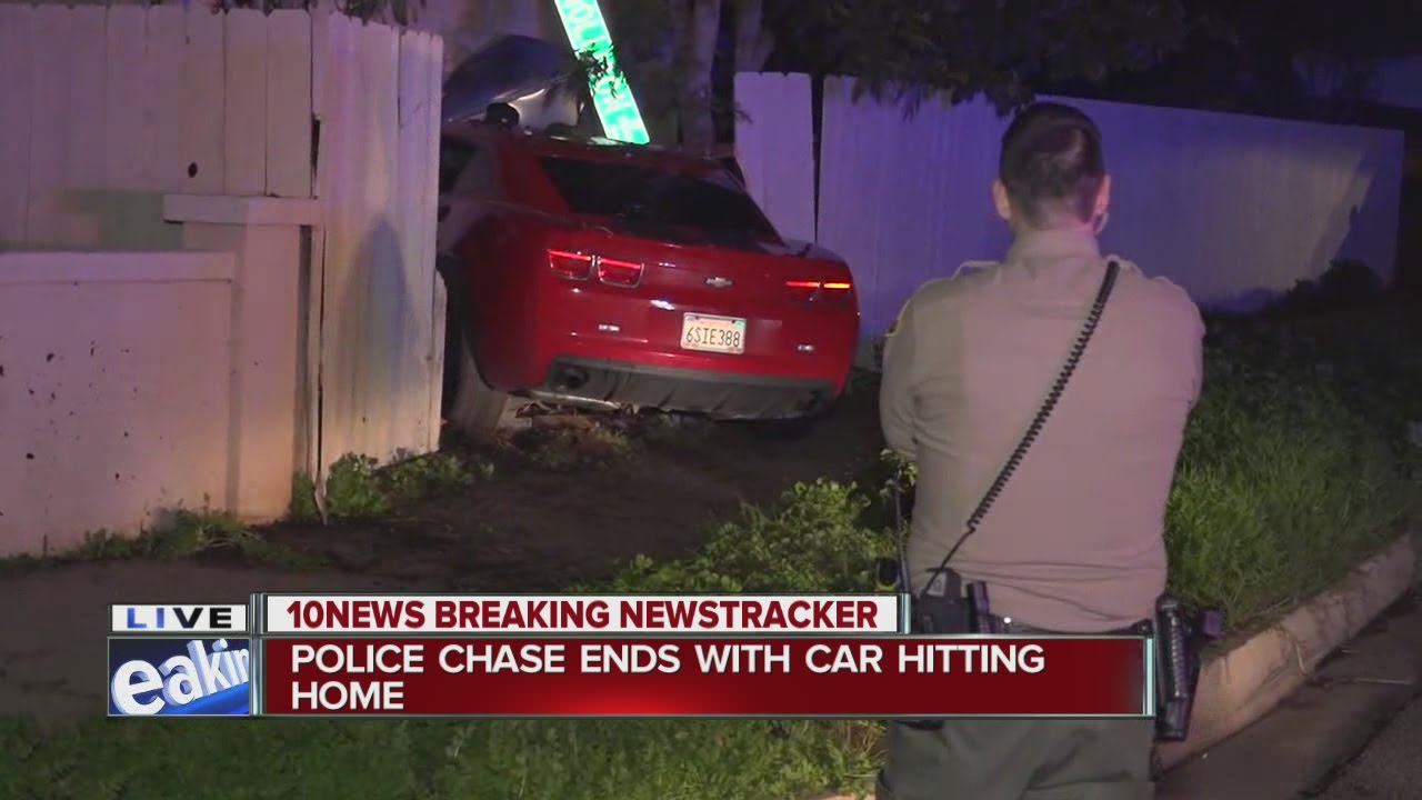 Police chase ends with car driving into a home - YouTube