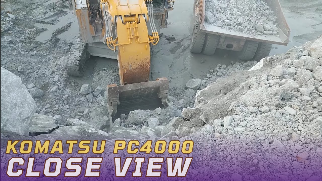 Two Komatsu PC4000 Excavators Loading Haul Trucks Heavy Machines In ...