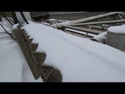 Removing Snow From Overpast Bridge Barrier - YouTube