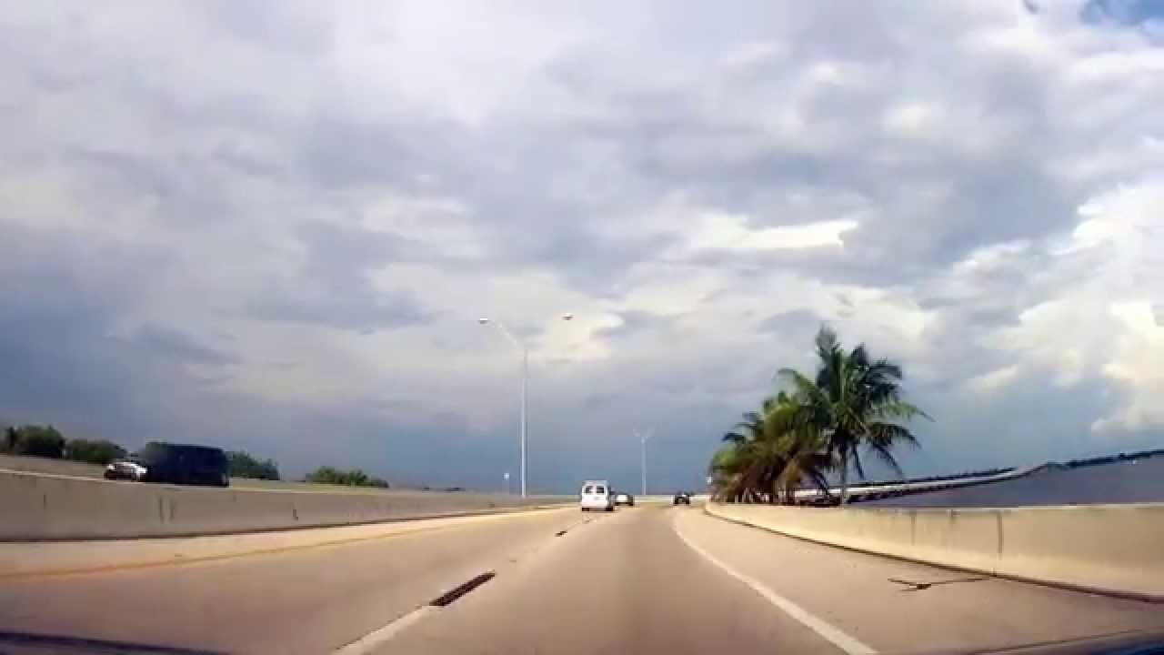 Driving across the Midpoint Bridge between Cape Coral and Fort Myers ...