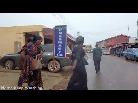 GHANA AFRICAN COMMUNITY WALK AFTER HEAVY RAINS ACCRA NUNGUA