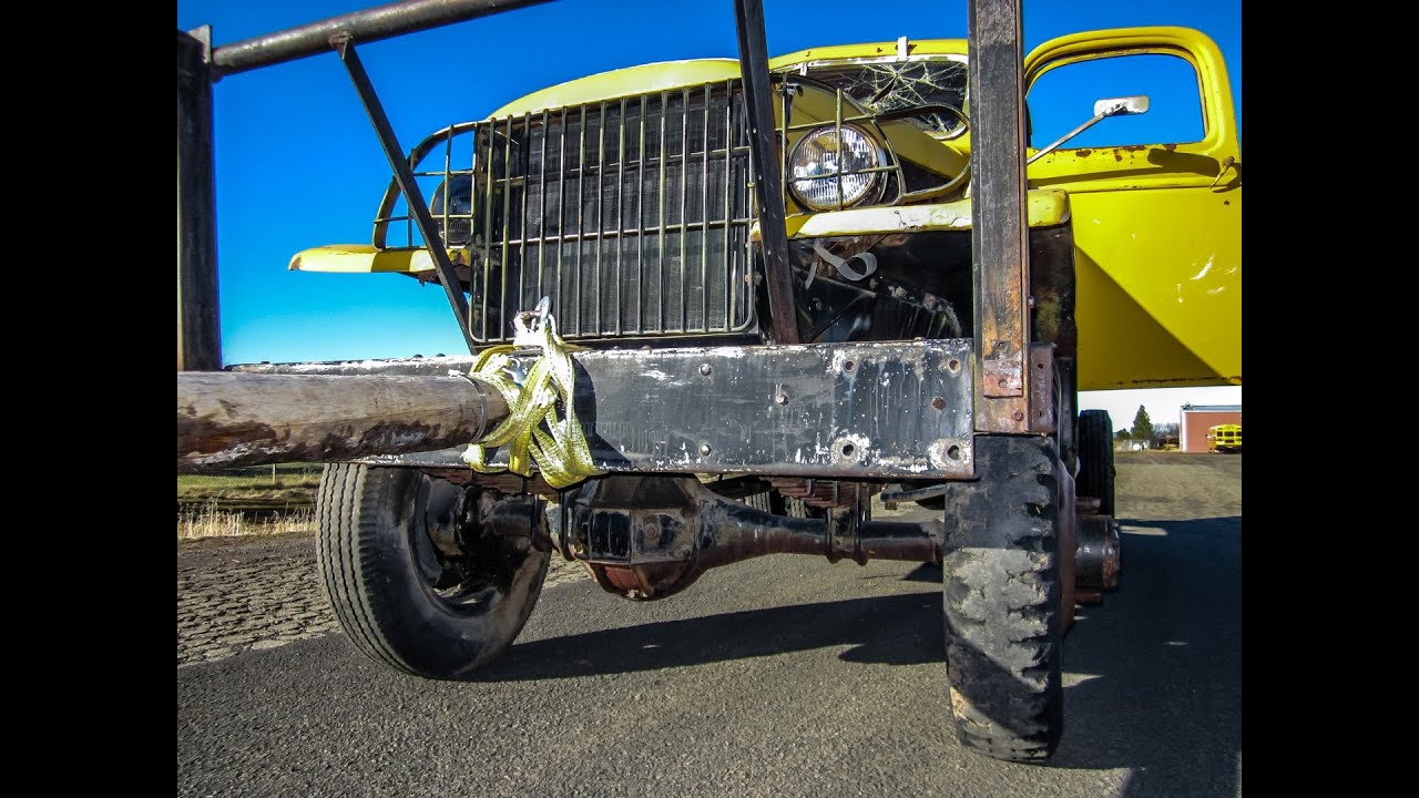 Flat towing a 1944 Chevrolet G506 1.5 ton truck with a 1978 Ford 4WD ...