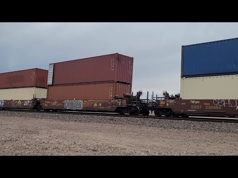 UP 7382 east @ Daggett. We counted atleast 4 open containers at various locations on the train ...