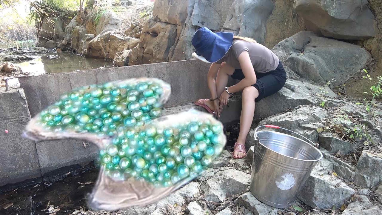 With green pearls as precious organic gemstones, happily engaged in ...