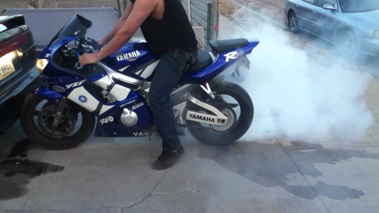 wheel hop on a motorcycle burnout - YouTube