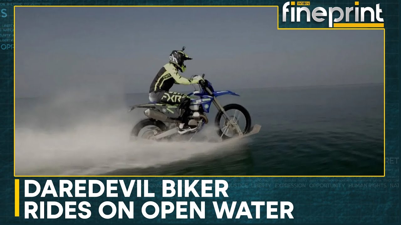 Georgian daredevil biker rides on surface of water | WION - YouTube