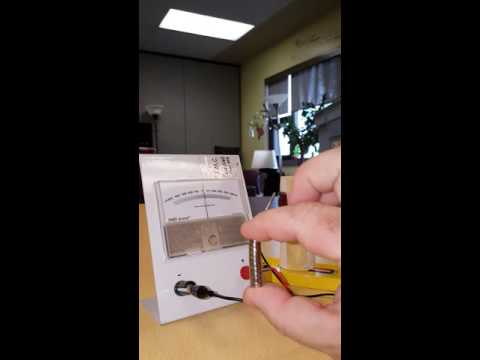 Magnet falling through a coil of copper wire - YouTube