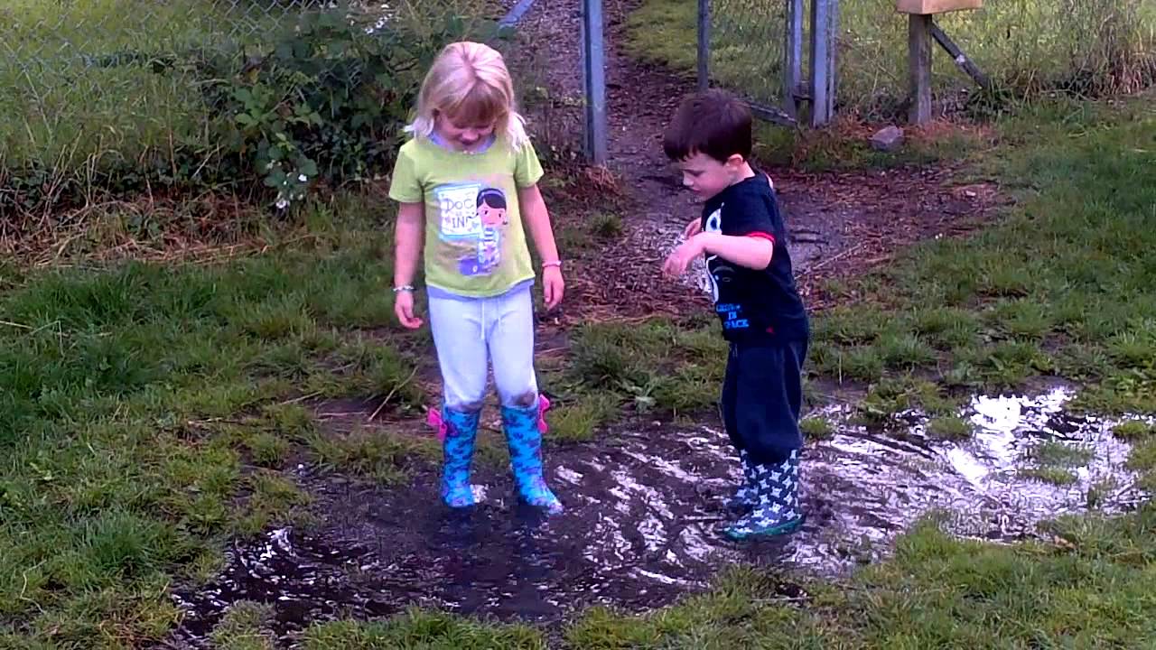 We all like splashing in muddy puddles! - YouTube