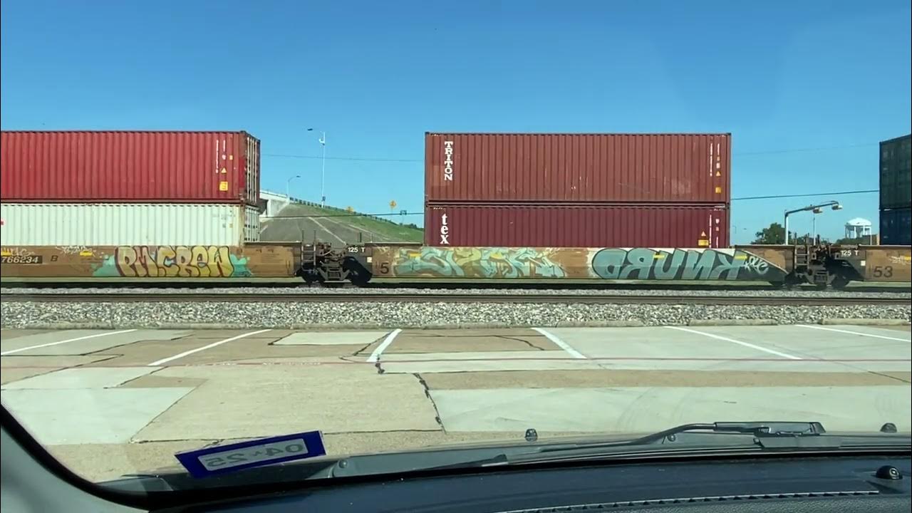 UP 6910 leads a Stack Train at Arlington, TX - YouTube
