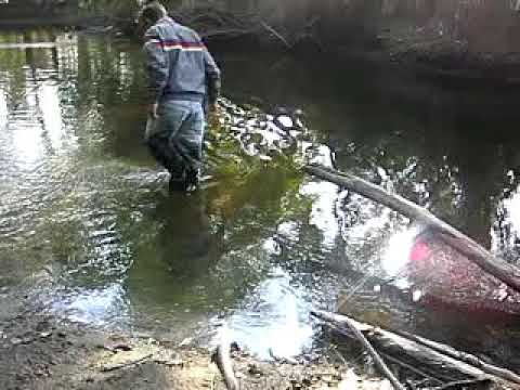 wellies in small river - YouTube