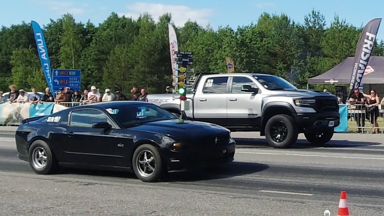 Dodge Ram 1500 TRX 6.2 vs Ford Mustang GT 5.0 1/4 mile drag race - YouTube