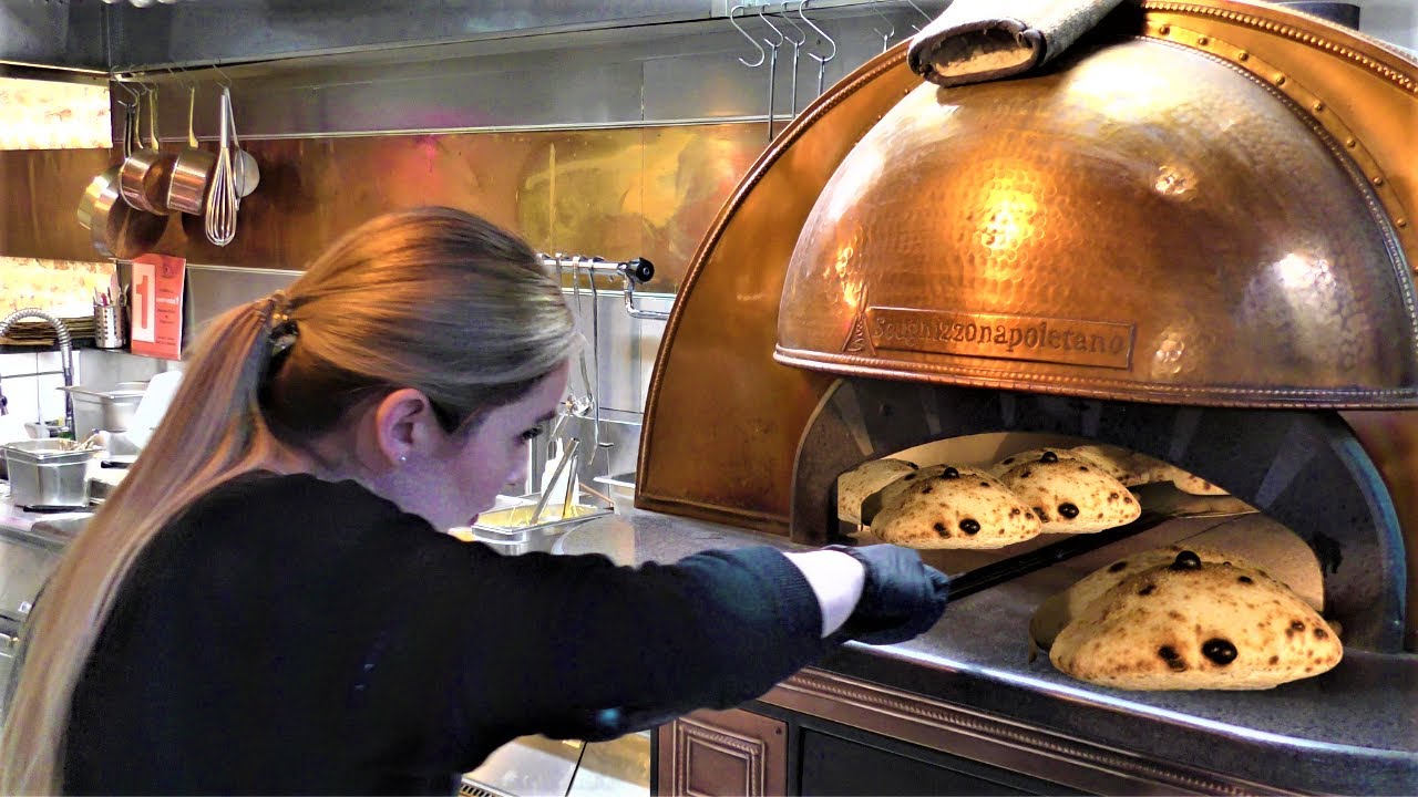 Cooking and Eating Italian Panuozzo from Naples. Street Food in Warsaw ...