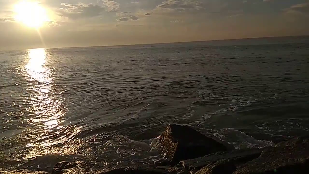 Sun Rise rays on ocean surface at Kanyakumari - YouTube
