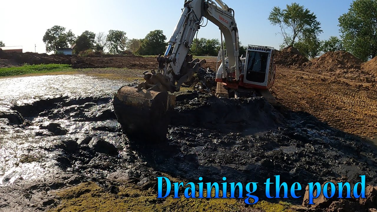 Digging Out And Draining The Pond - YouTube