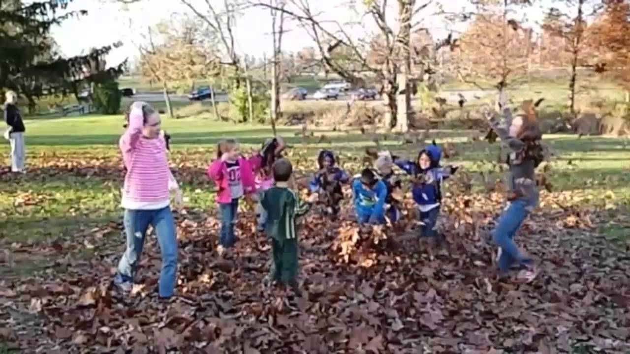 Kids playing in leaves - YouTube