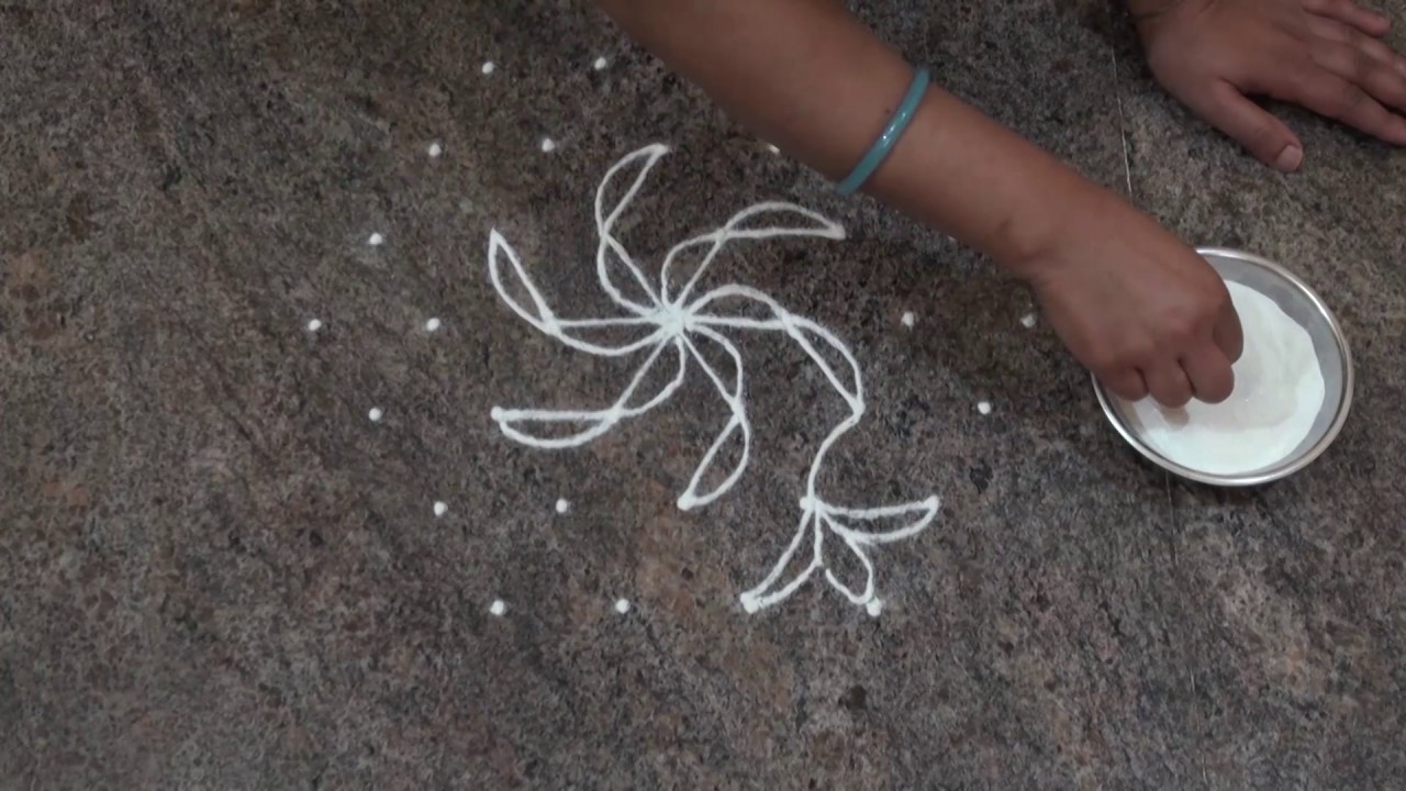 simple and easy rangoli design/ simple chukki rangoli with 7 dots - YouTube