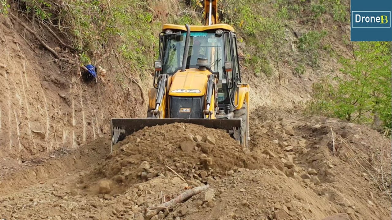 Grading Hilly Road after Excavator-JCB Backhoe Loader - YouTube