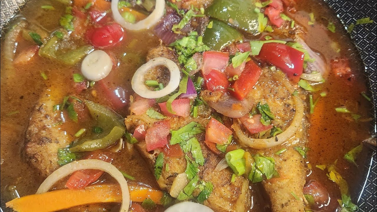 Guyanese steam gray snapper fish in tomatoe butter sauce serve turn ...