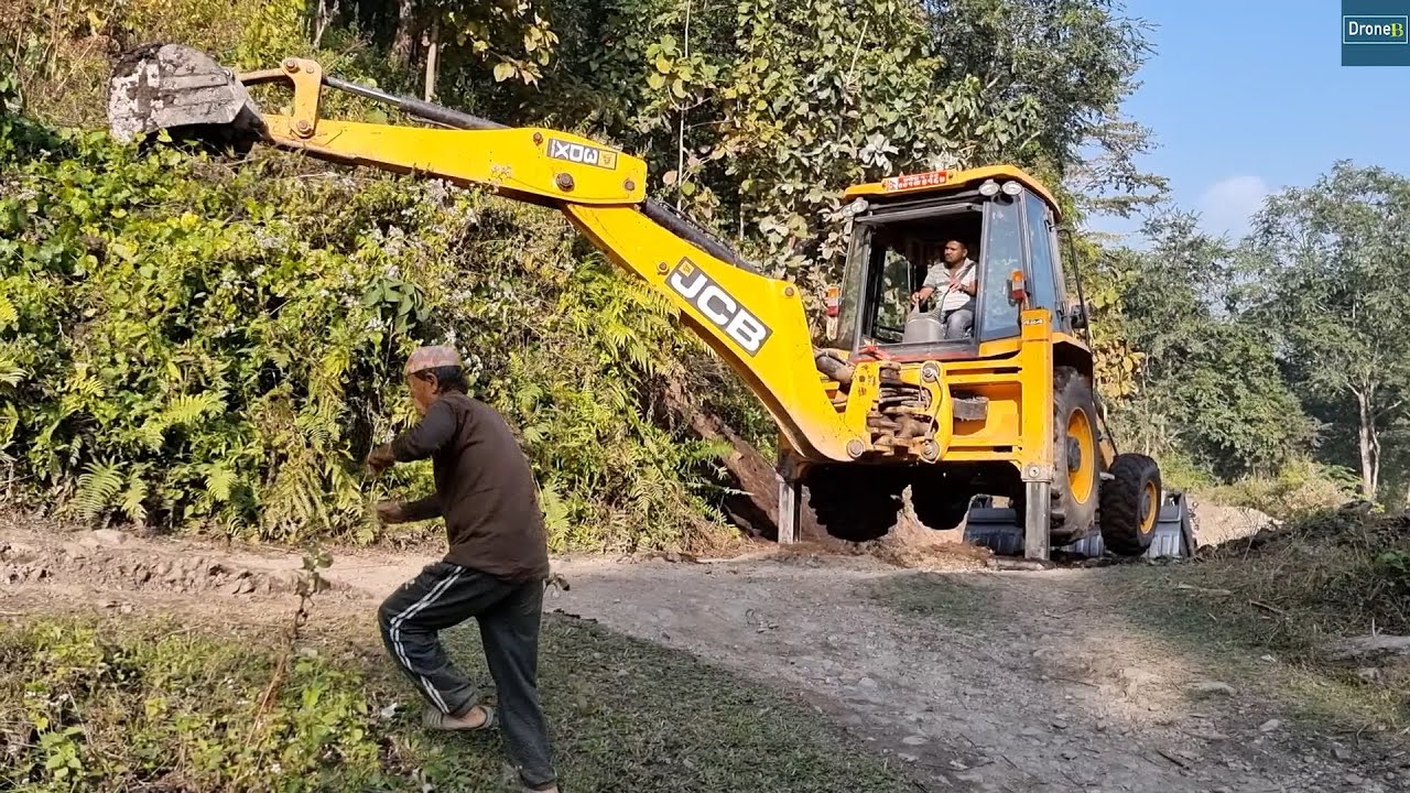 Hillside Motorable Road Making with JCB Backhoe - YouTube